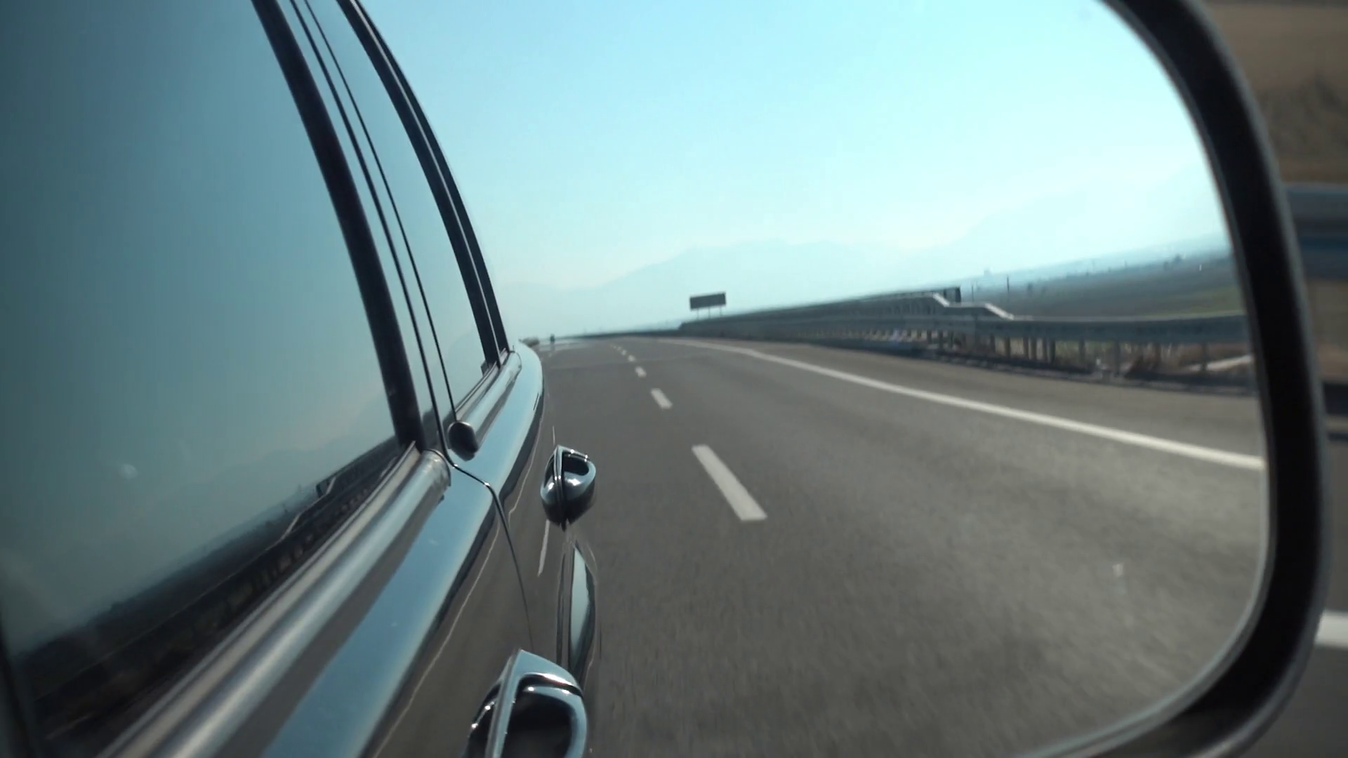 Road Through Rear View Mirror Of Car Stock Footage SBV-347431729 ...