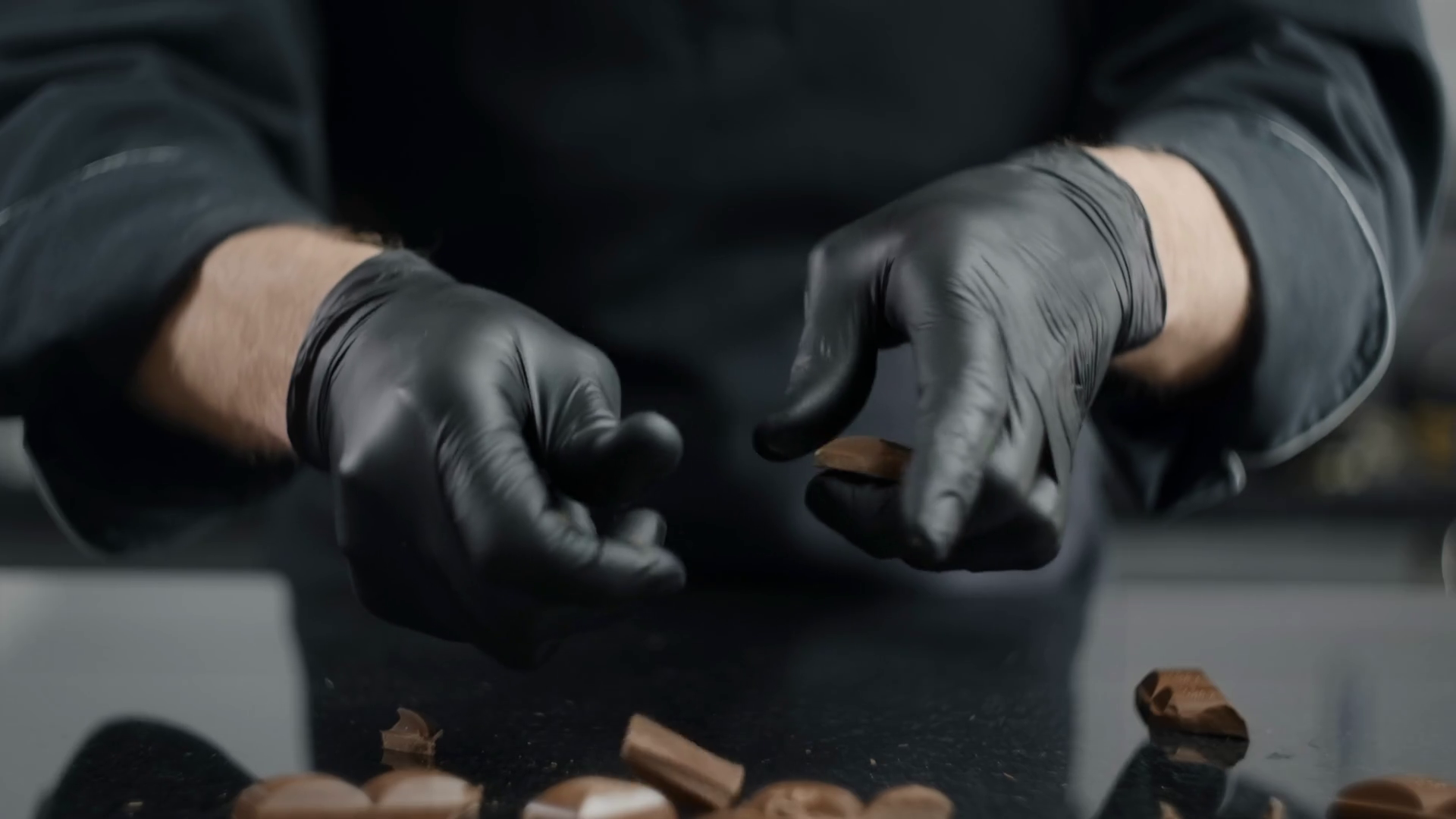 Chef Chocolatier Breaks Chocolate Bar To Stock Footage SBV-338439777 ...