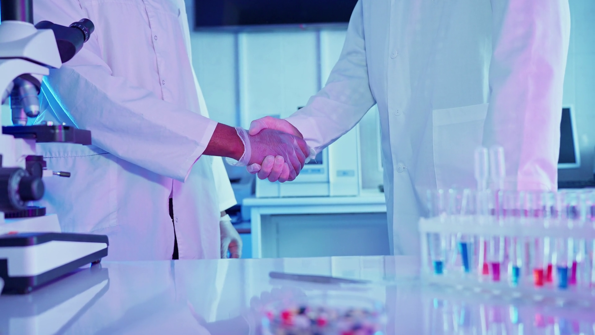 Scientists Shaking Hands In Lab With Test Stock Footage SBV-349190872 ...
