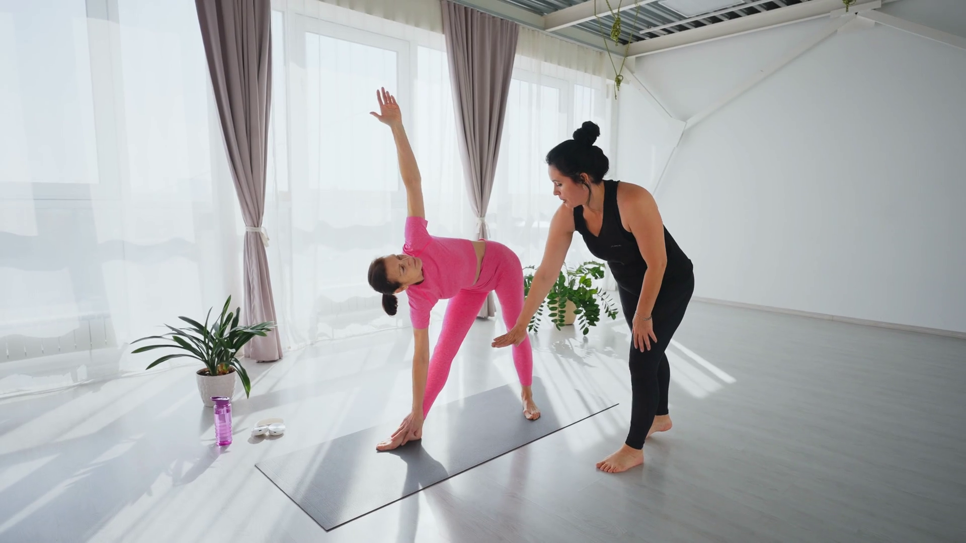 Female Instructor Teaches Yoga Poses To Stock Footage SBV-348588581 ...