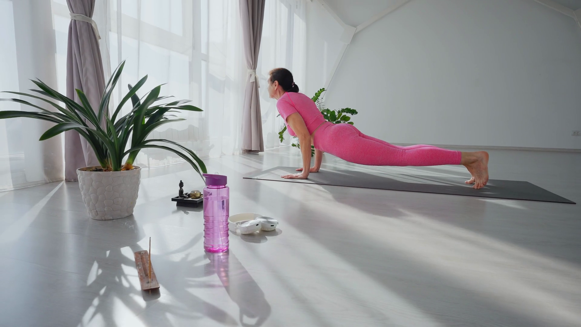 Elderly Woman Does Yoga Exercises Stock Footage SBV-348641599 - Storyblocks