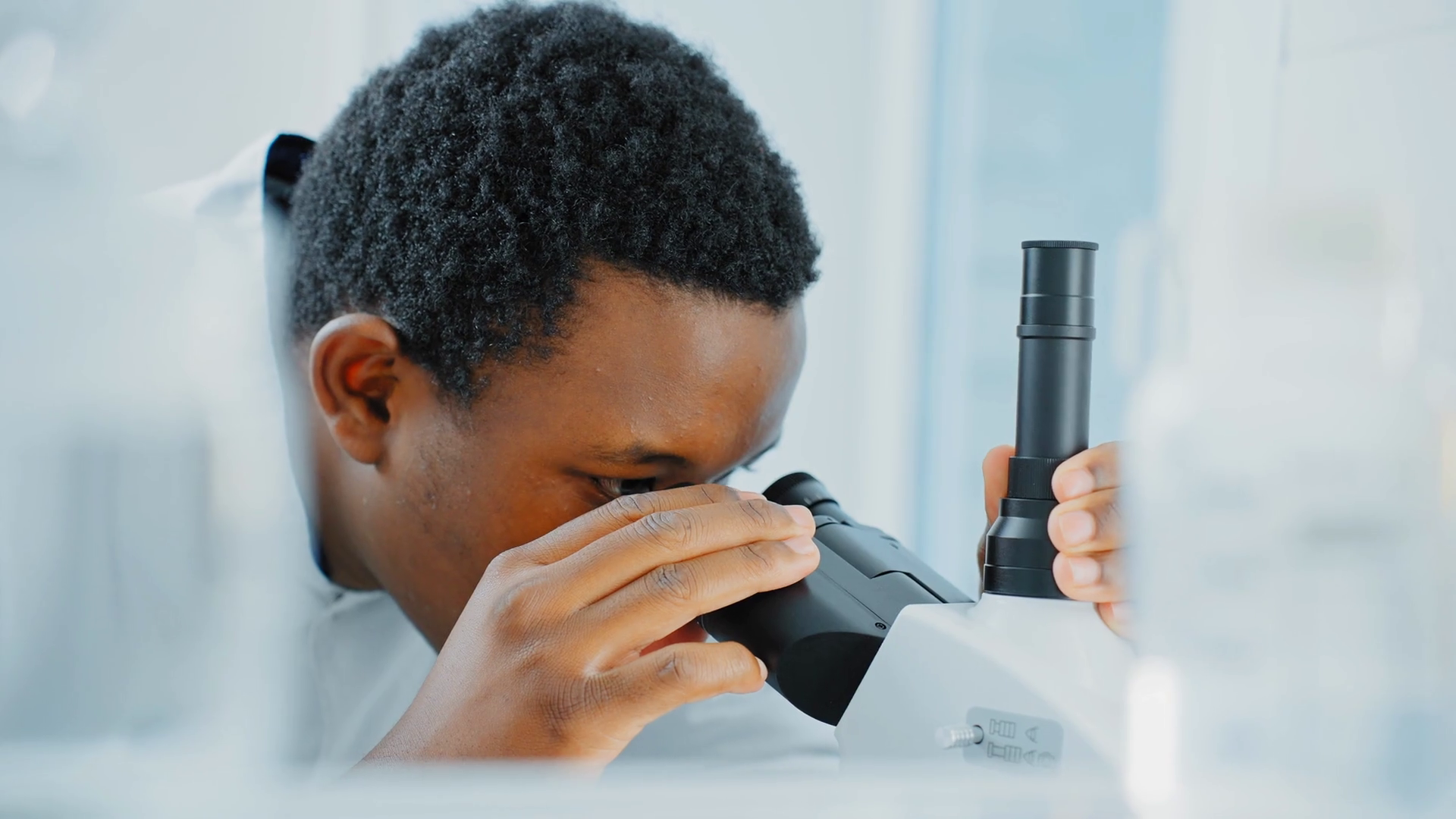 African-american Man Looking In Microscope Stock Footage SBV-348747679 ...