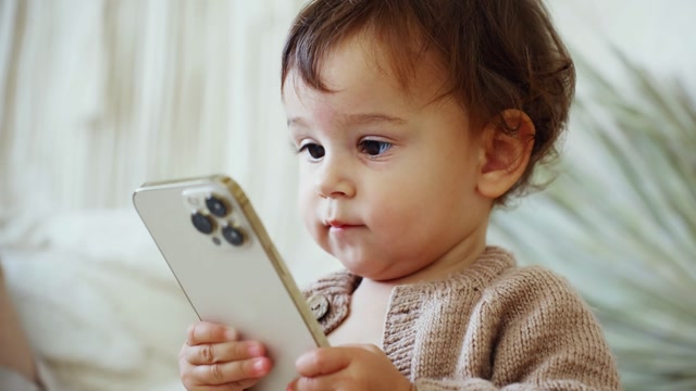 Little Girl Mobile Stock Footage: Royalty-Free Video Clips - Storyblocks