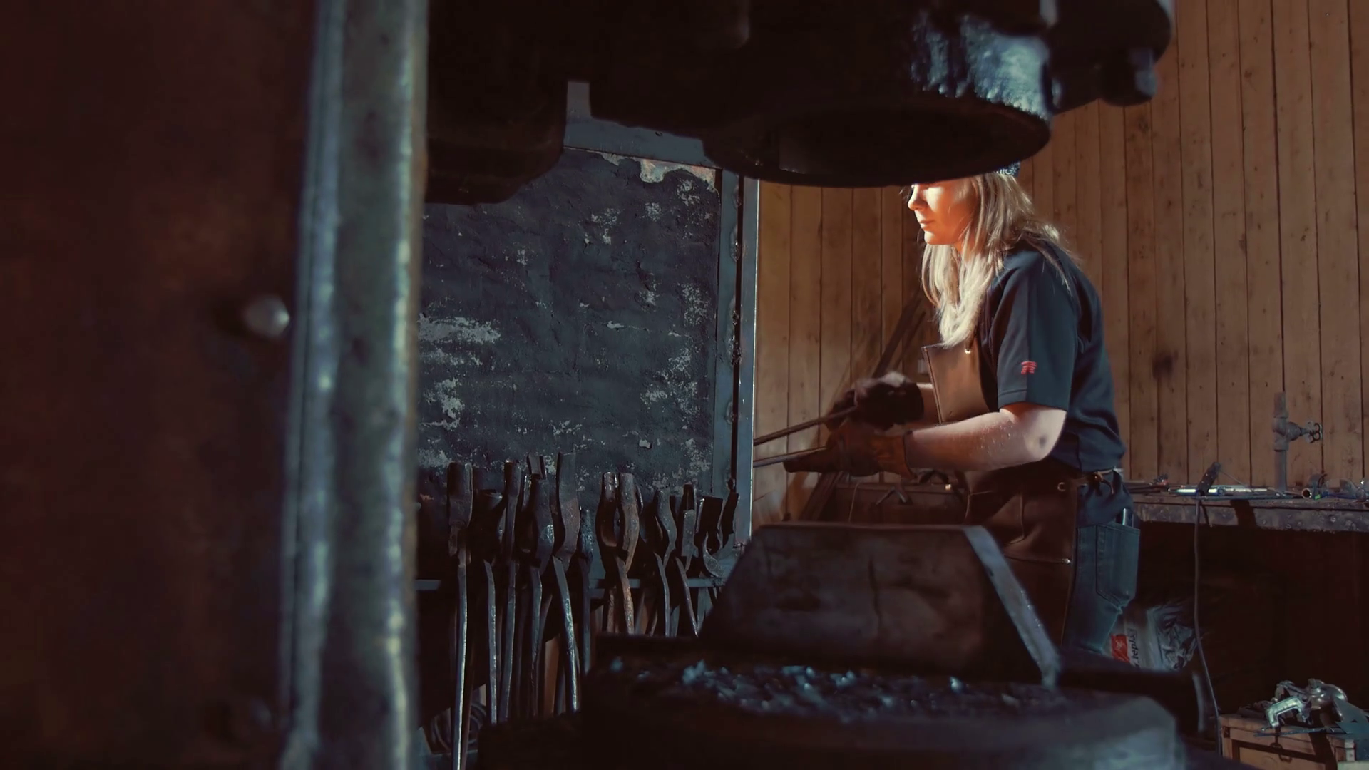 Woman Blacksmith Forges Horseshoe Stock Footage SBV-310631934 - Storyblocks