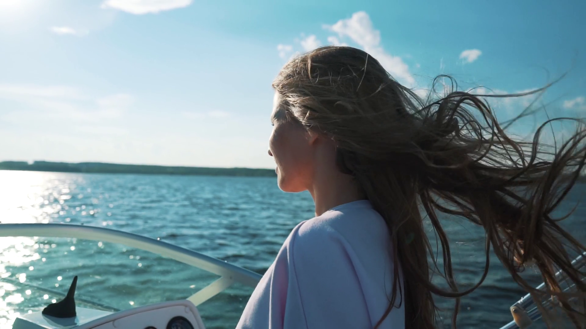 A Woman Is Driving Boat Hair In Wind Stock Footage SBV-316477813 ...