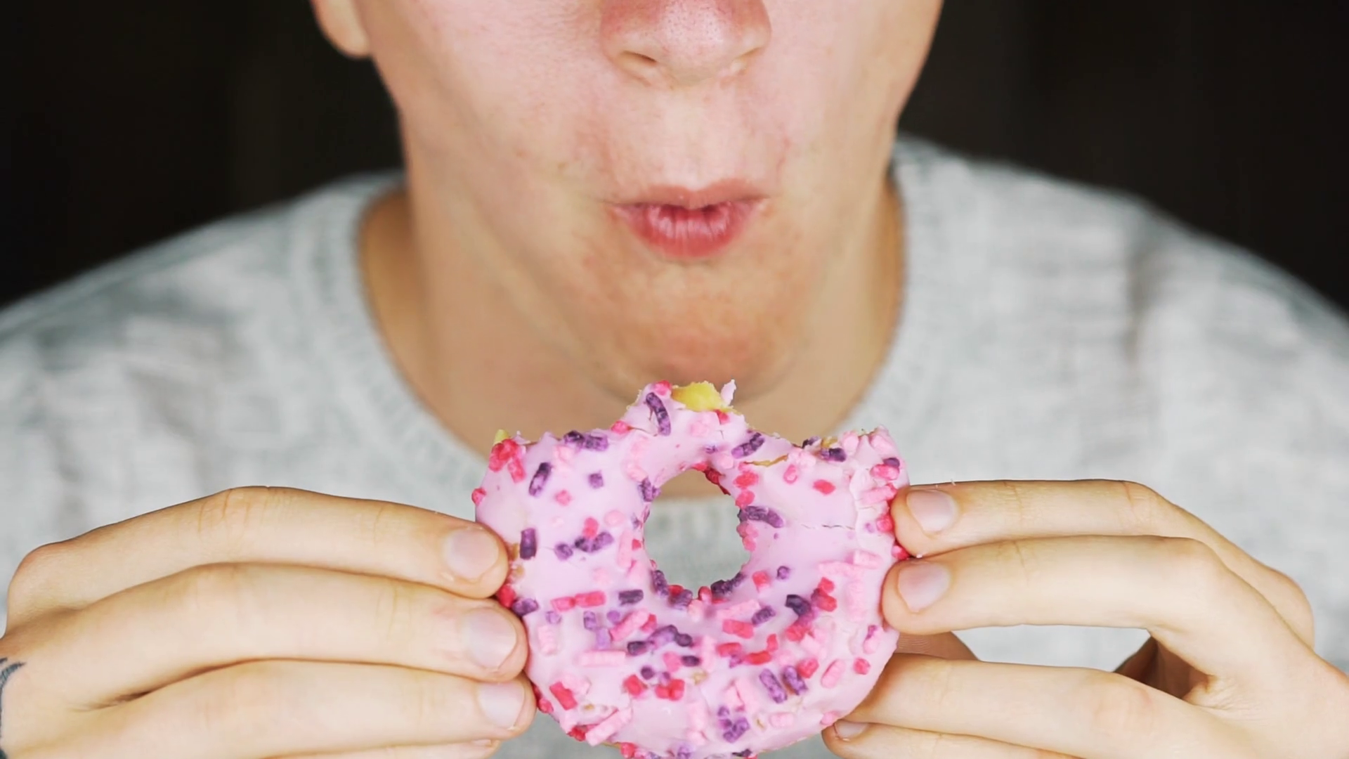 Portrait Of Young Hungry Man Eating Donut Stock Footage SBV-325633484 ...