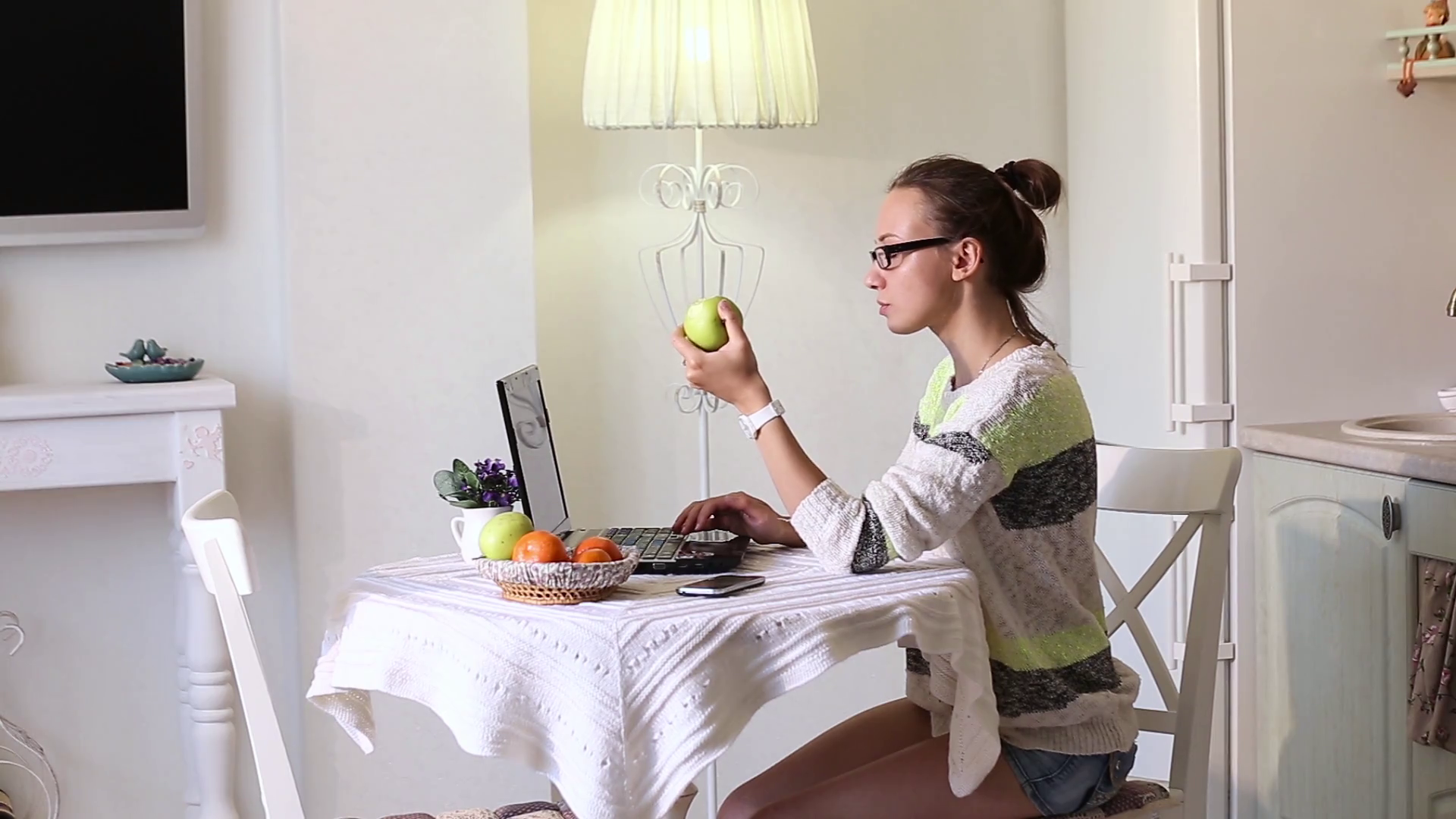 Woman Eating Fruit Working On Computer In Stock Footage SBV-309697806 ...