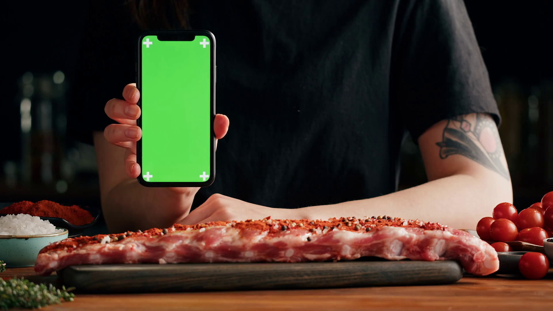 Woman chef cooking ribs close-up. Professinal cheif preparing pork meat ...