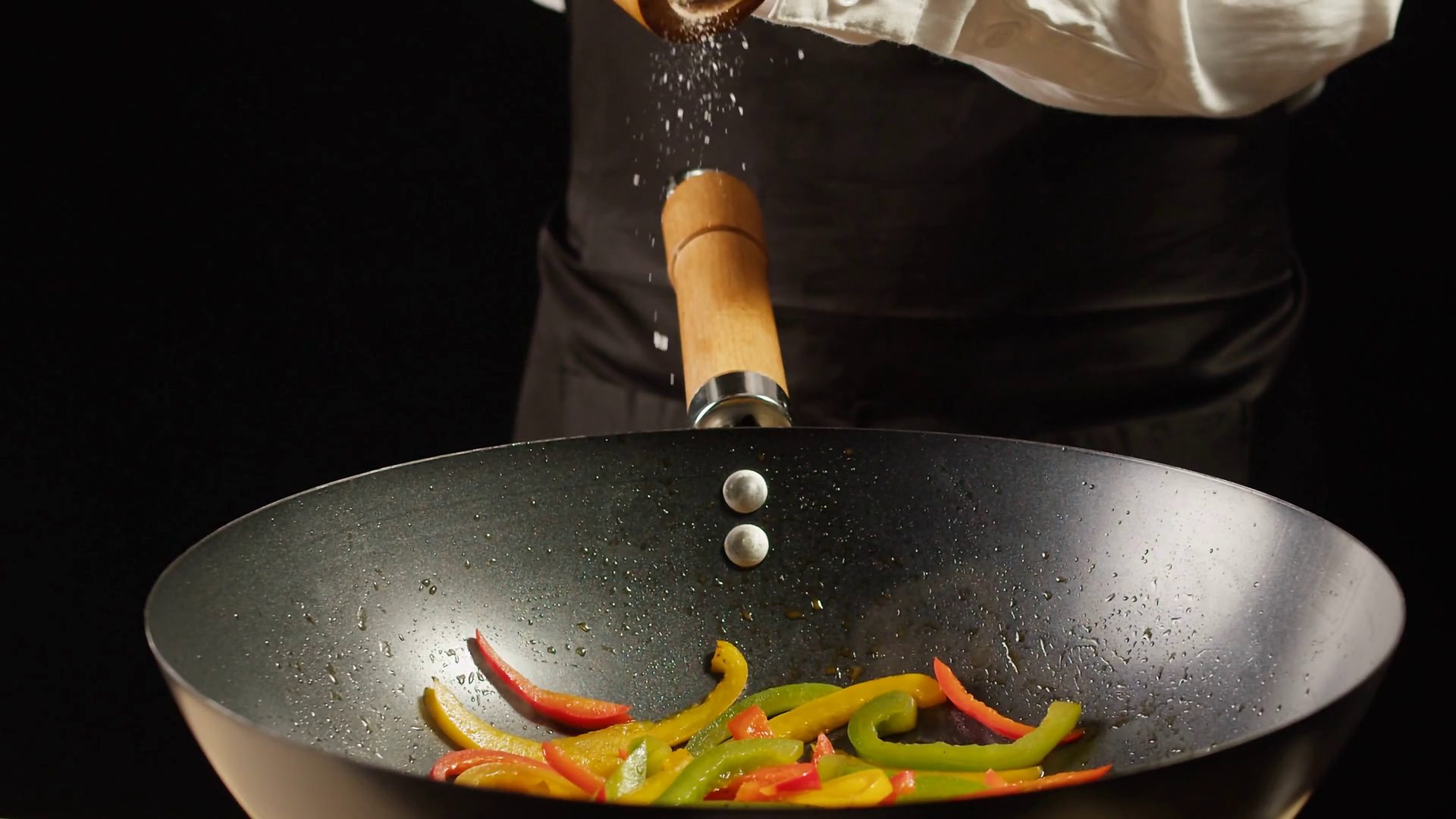Chef Adding Salt To Mixed Vegetables In Wok Stock Footage SBV-348830931 ...