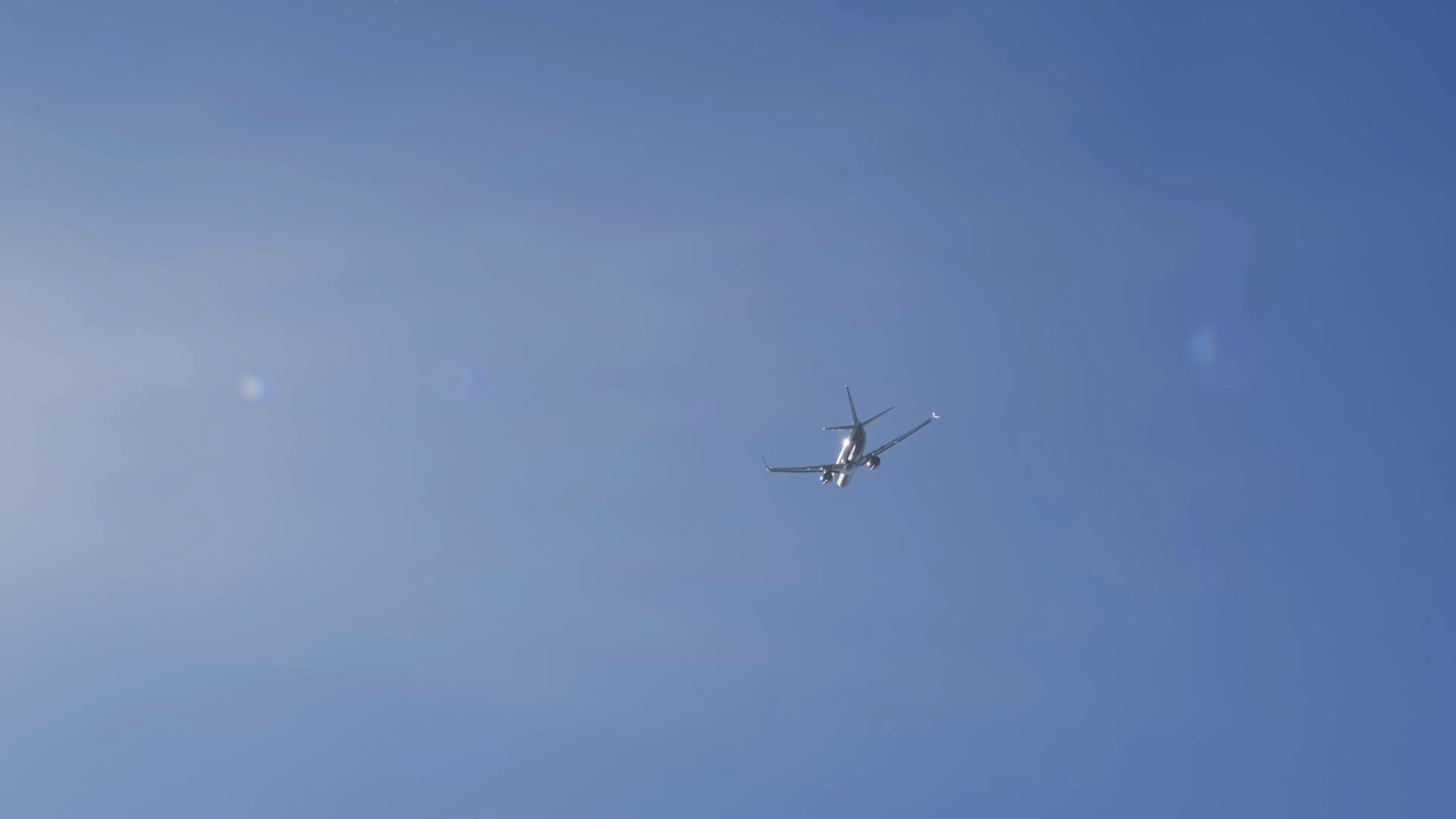 Airplane Fly Away Blue Sky Large Airplane Is Stock Footage SBV ...