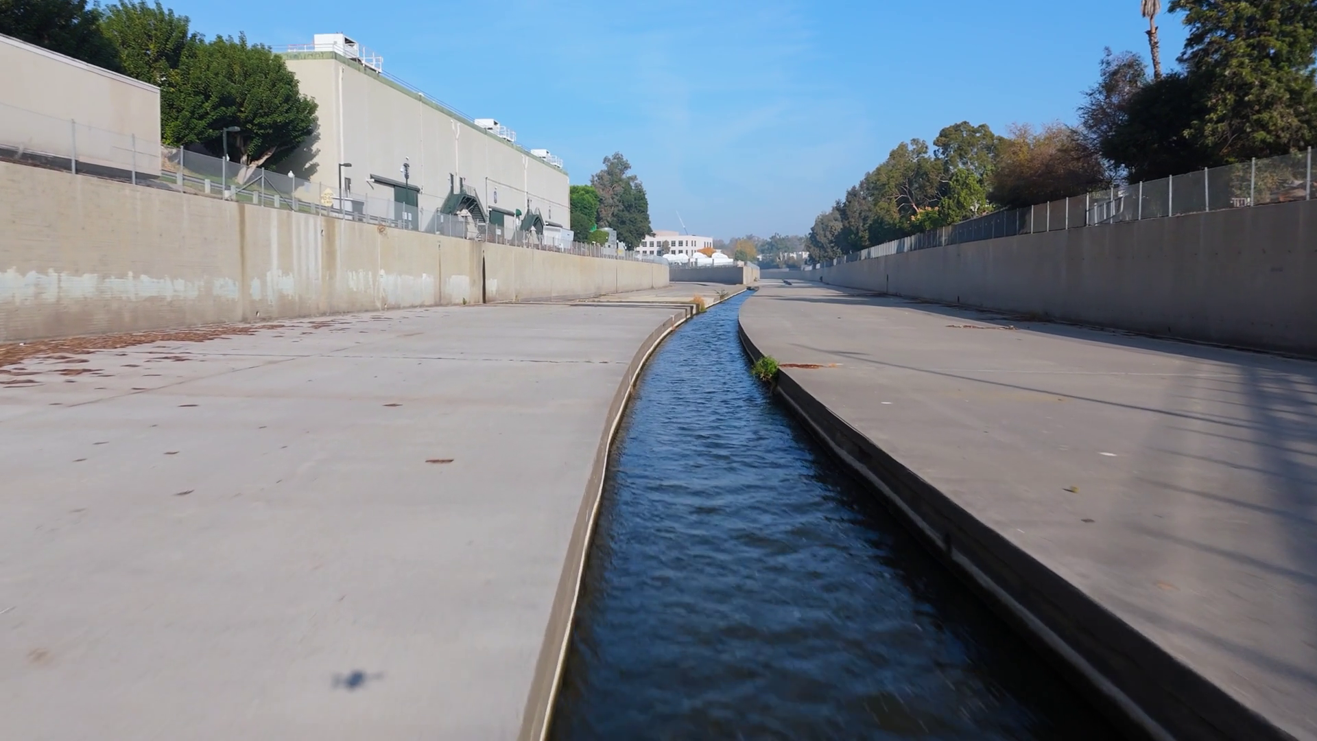 A Serene Urban River Channel Located Beneath Stock Footage SBV ...
