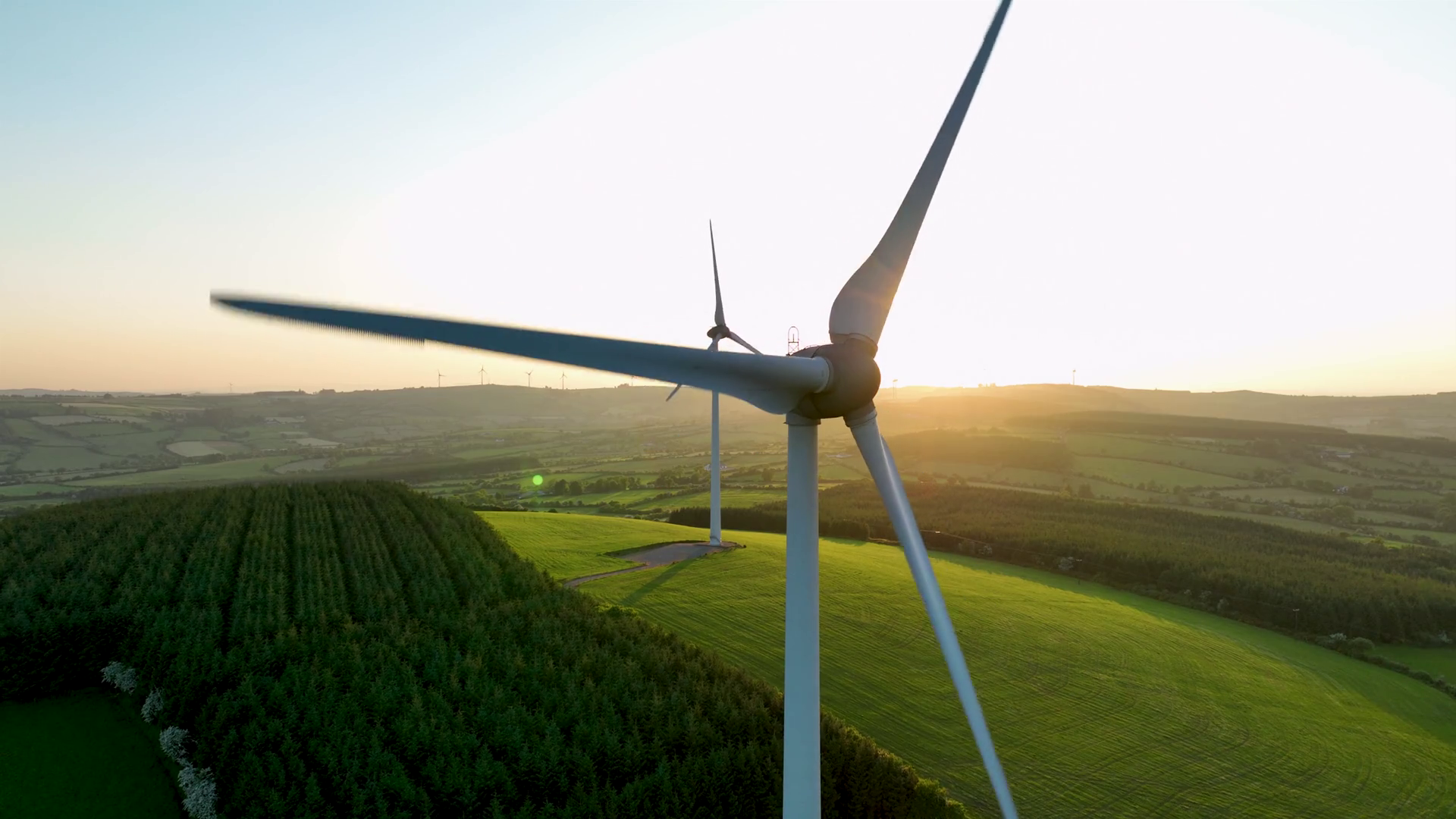 Two Powerful Wind Turbines Stand At Sunset Stock Footage SBV-348416873 ...