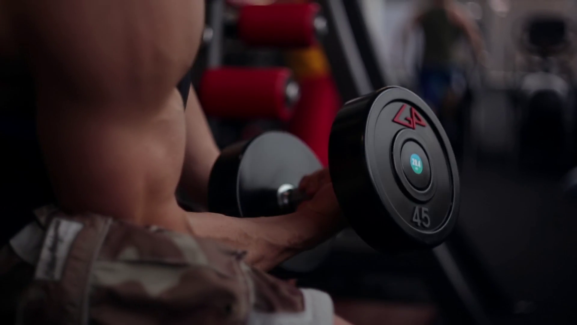 Athlete man is doing exercise with sport equipment. Close-up of a ...