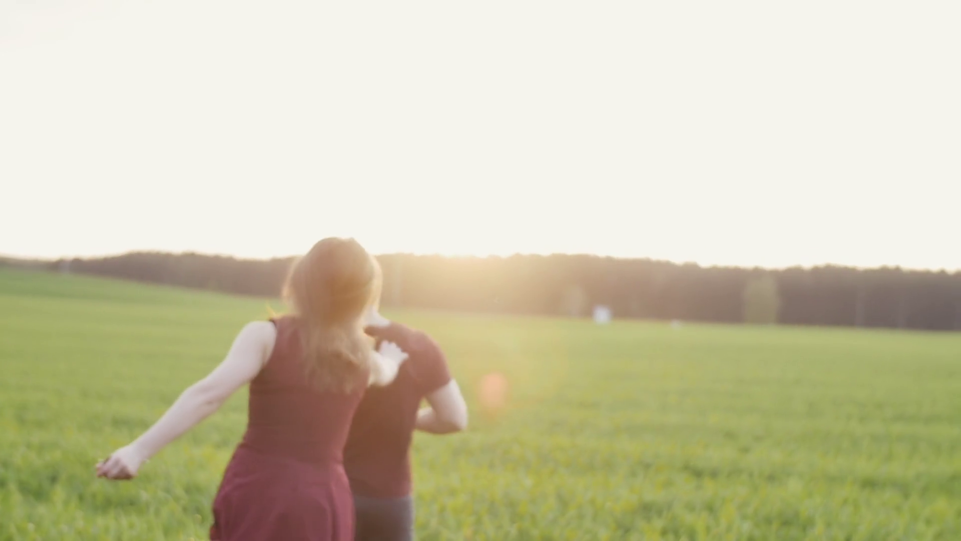 Happy Woman Chases Man Running In Field At Stock Footage SBV-310714531 ...