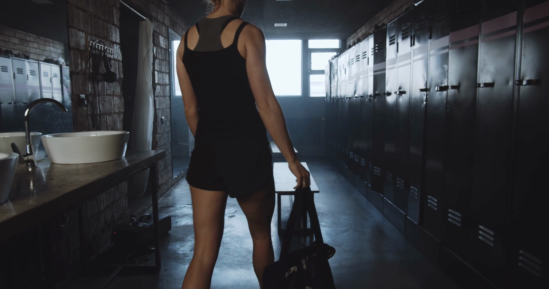 Young Athletic Caucasian Woman Entering Dark Stock Footage Sbv