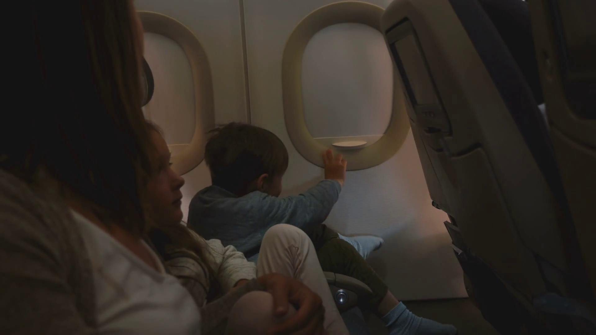 Curious Child Opens Airplane Window Cover Stock Footage SBV-332582833 ...