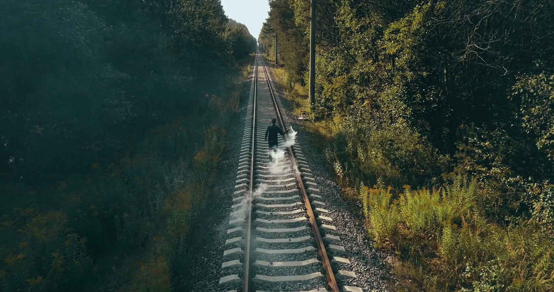 Man Running On Train Tracks With Smoke Bomb Stock Footage SBV-319643886 ...