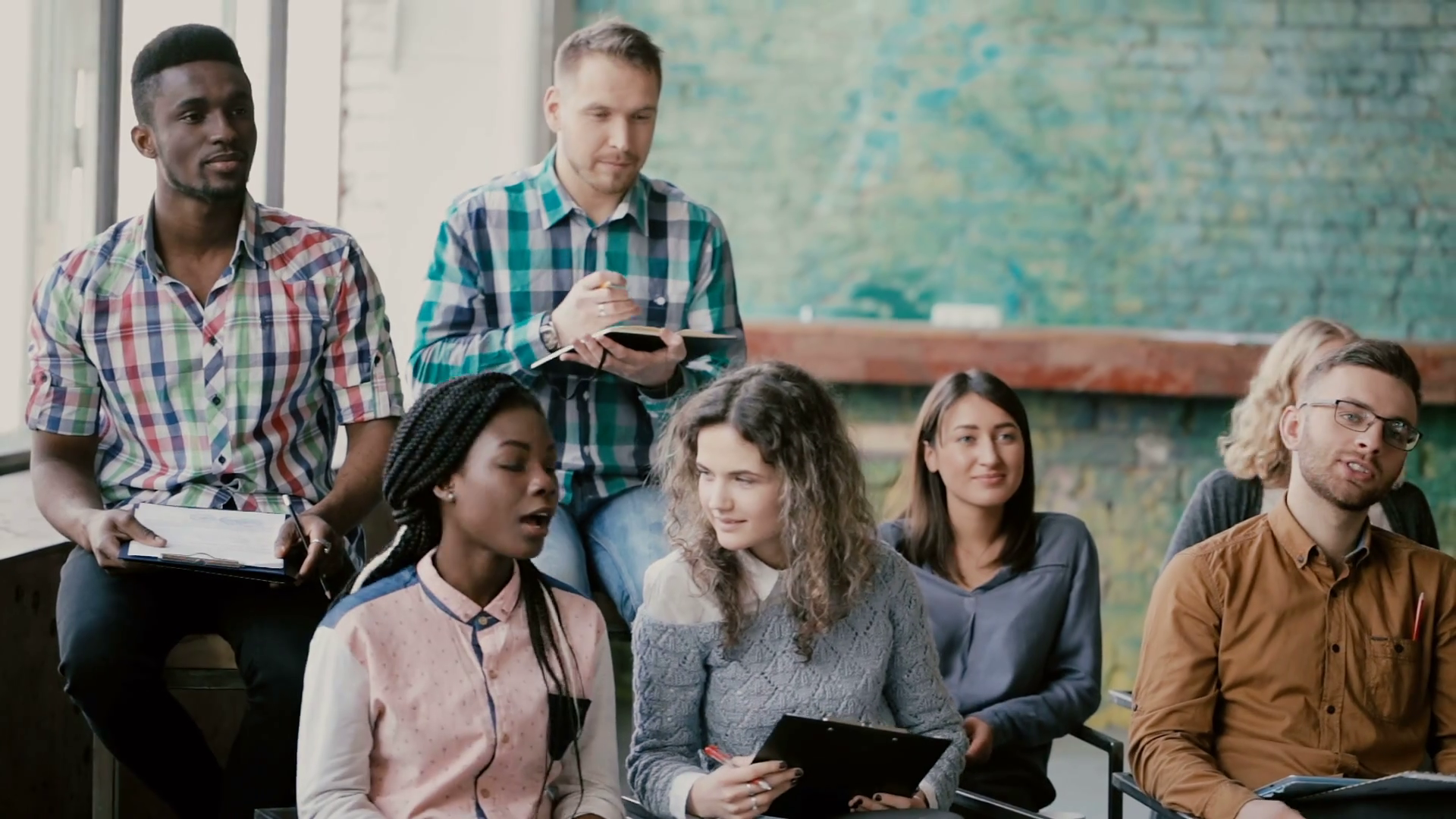 Mixed Race Group Of People Sitting Together Stock Footage SBV-314426989 ...