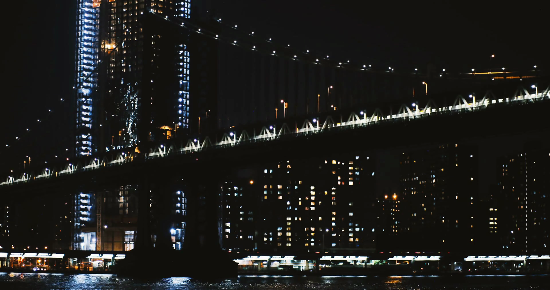 Night Manhattan Bridge timelapse 4K New York. Low angle view of ...