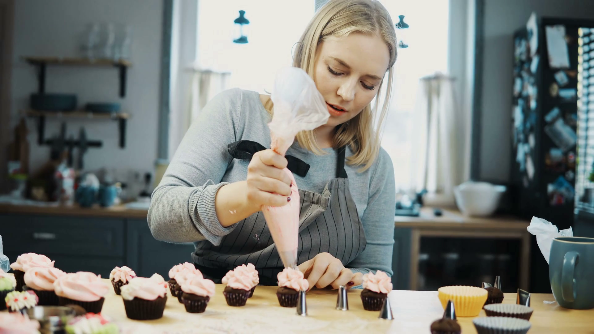 Skilled Pastry Chef Decorates Cupcakes With Stock Footage SBV-317198154 ...
