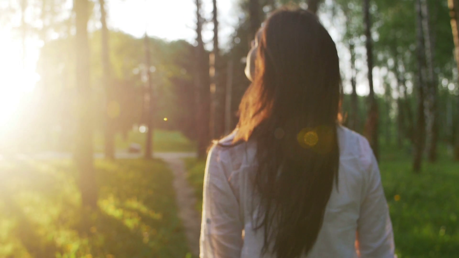 Woman walking in the forest at sunset. Slow motion Stock Video Footage ...