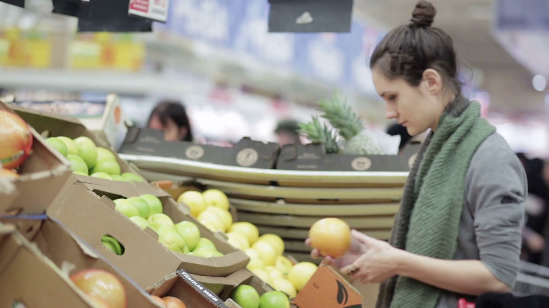 Young Woman Chooses Grapefruit On Store Stock Footage SBV-304763143 ...