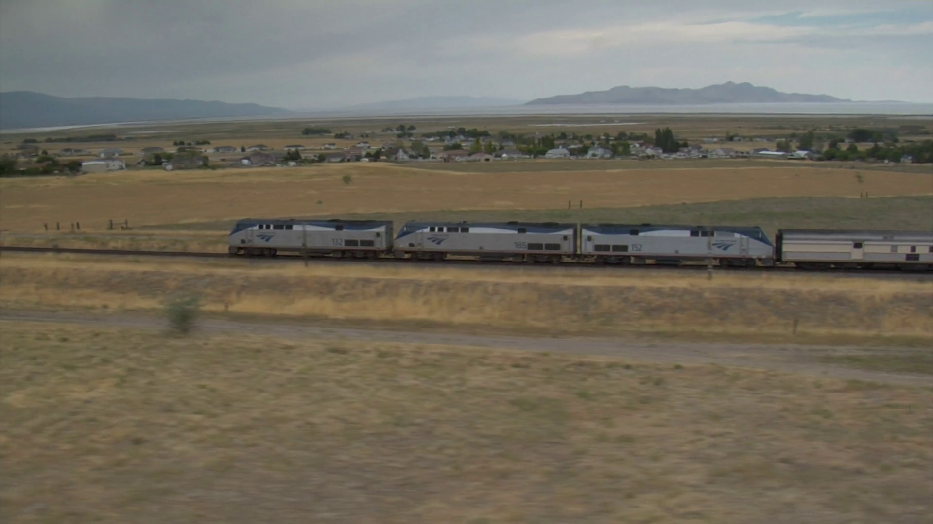 Aerial Shot Of Amtrak Train Desert Town Stock Footage SBV-300151377 ...