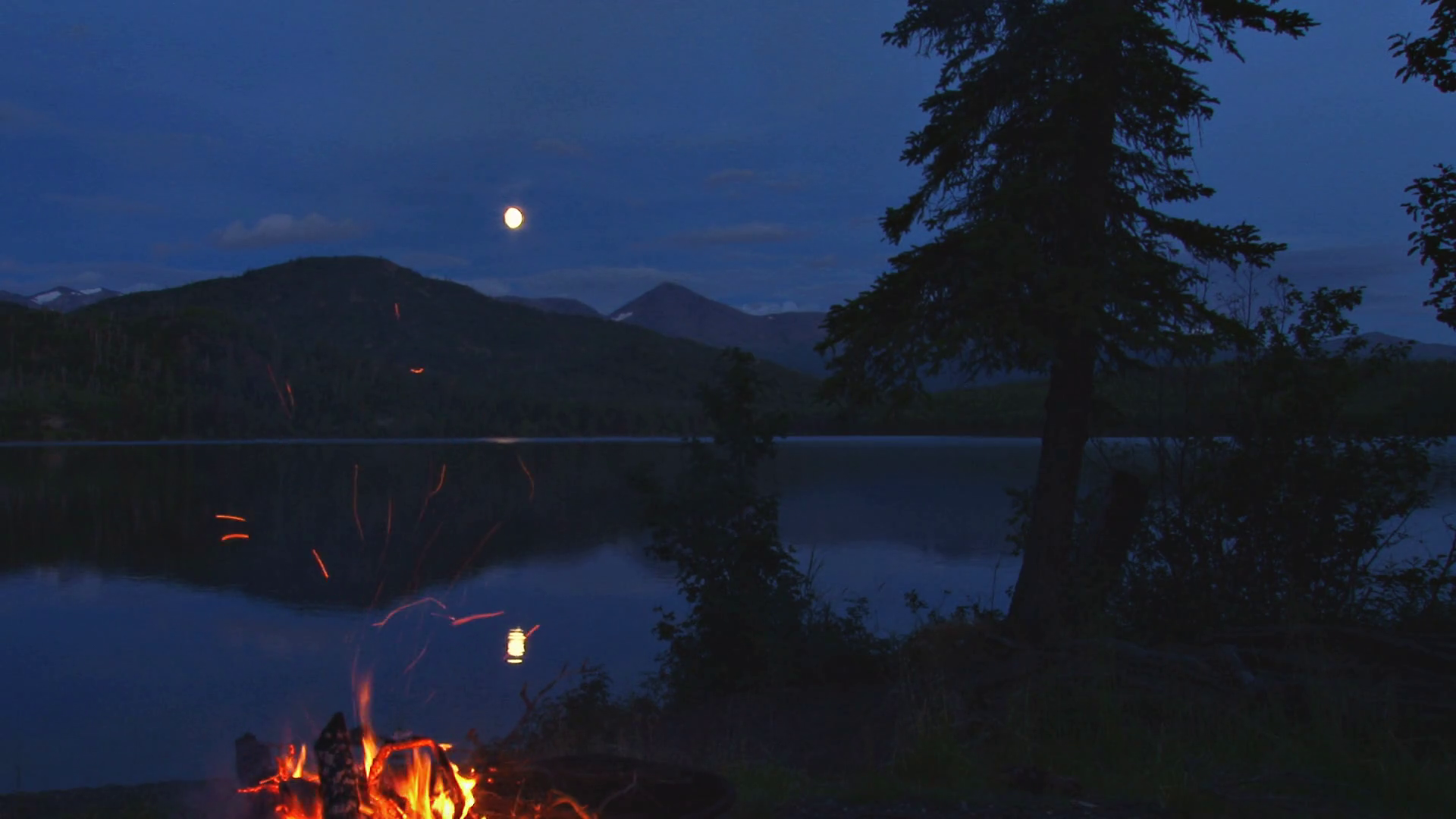 Campfire Mountainside Lake Stock Footage SBV-300129314 - Storyblocks