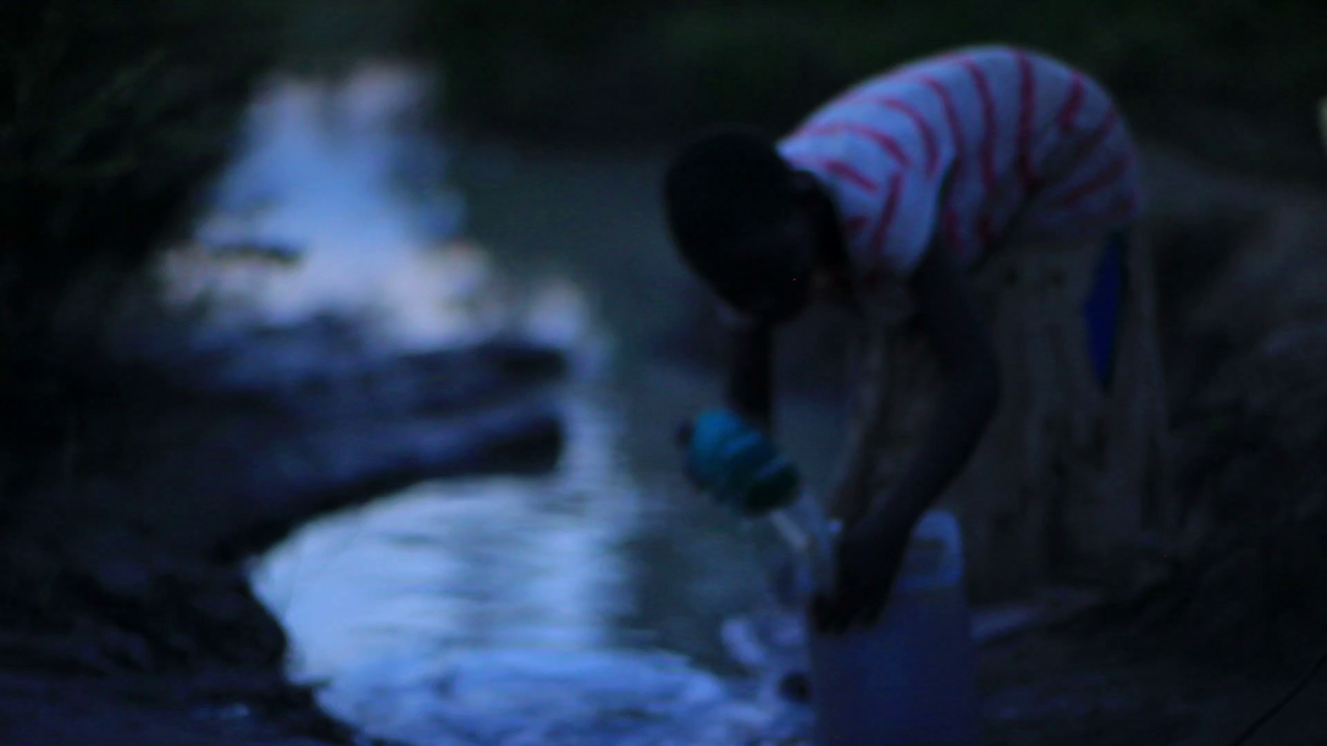 Child Gathering Water Near Village In Kenya Stock Footage SBV-300065396 ...