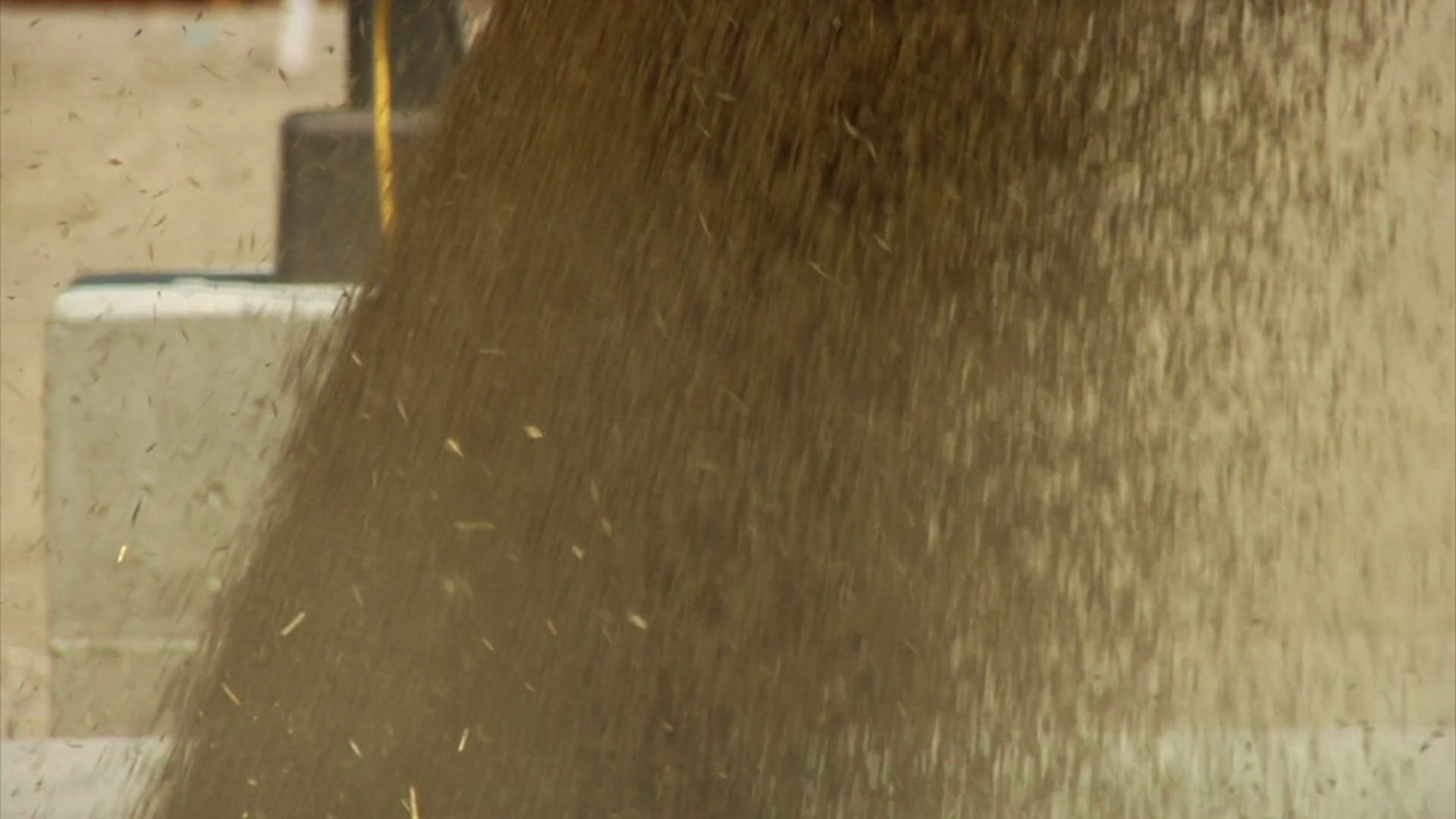 Close-up On Grain Pouring Into Metal Grate Stock Footage SBV-300146791 ...