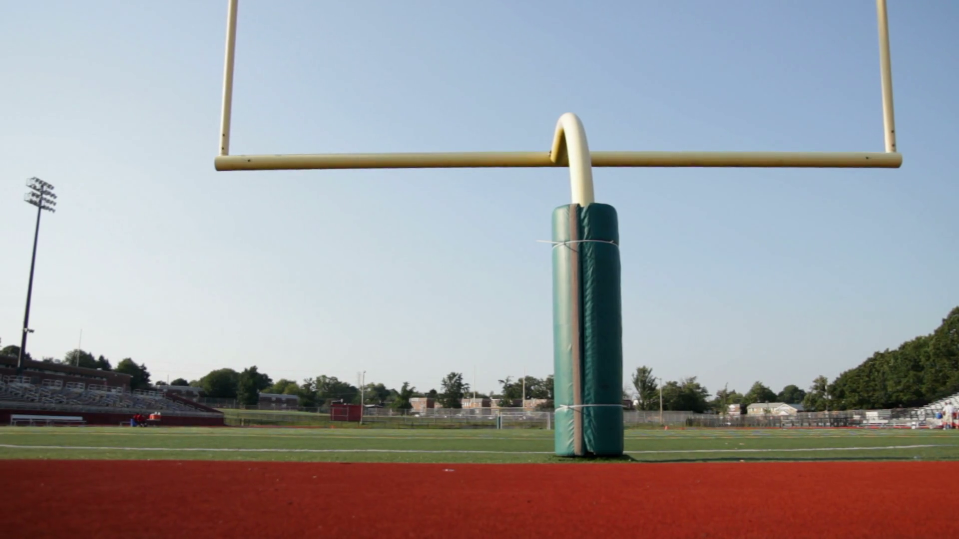 Dolly Of Football Field With Yellow Goalpost Stock Footage SBV ...