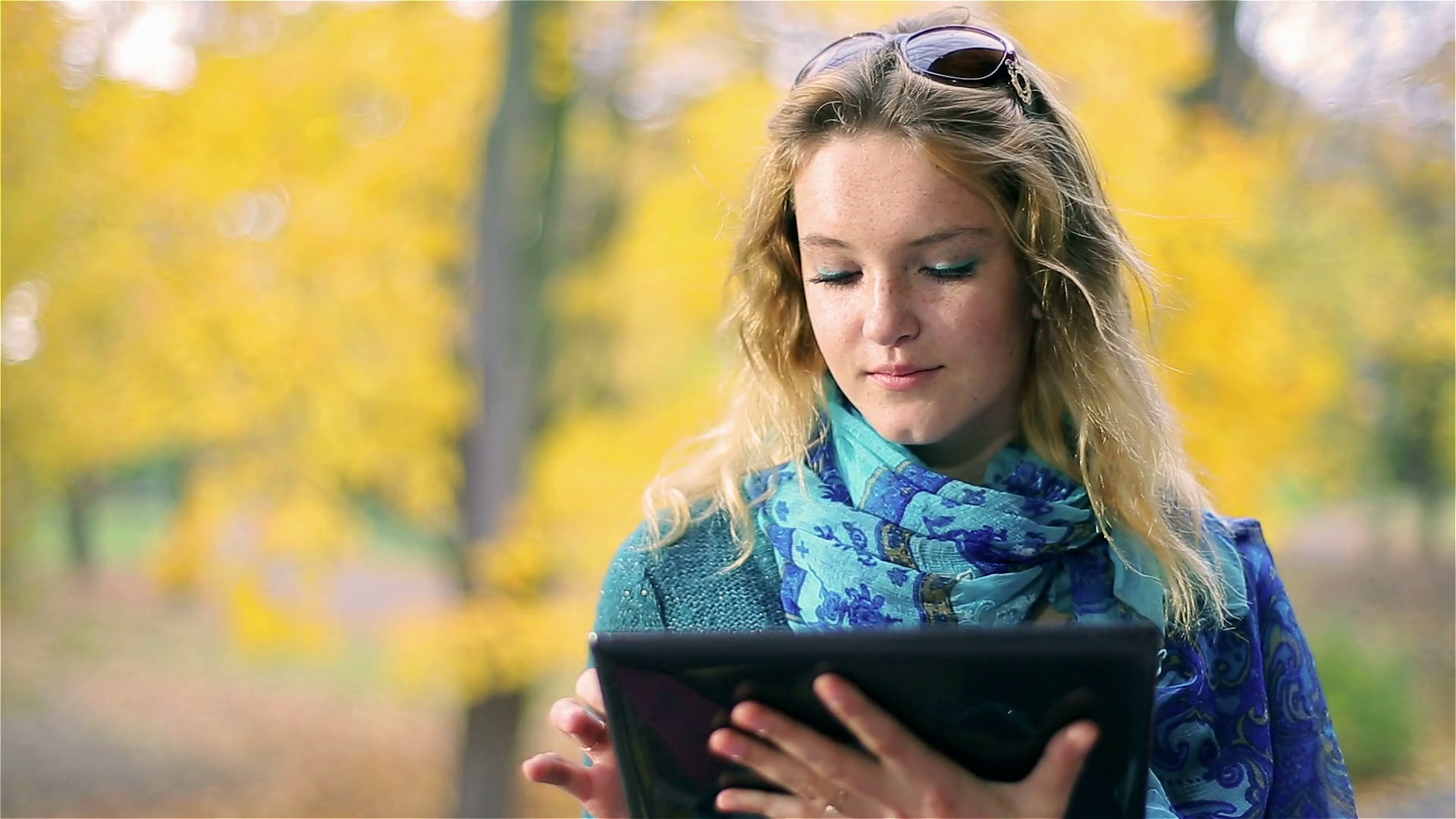 Happy Girl Browsing Internet On Tablet In The Park Stock Video Footage Storyblocks