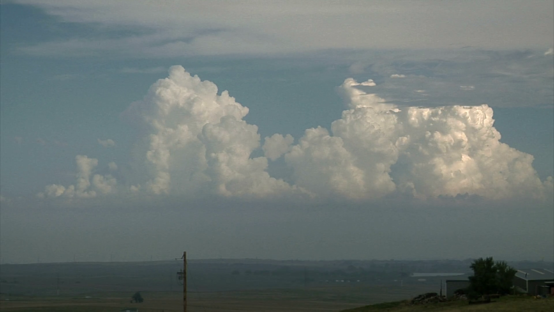 Huge White Storm Clouds Forming In Distance Stock Footage SBV-300124098 ...
