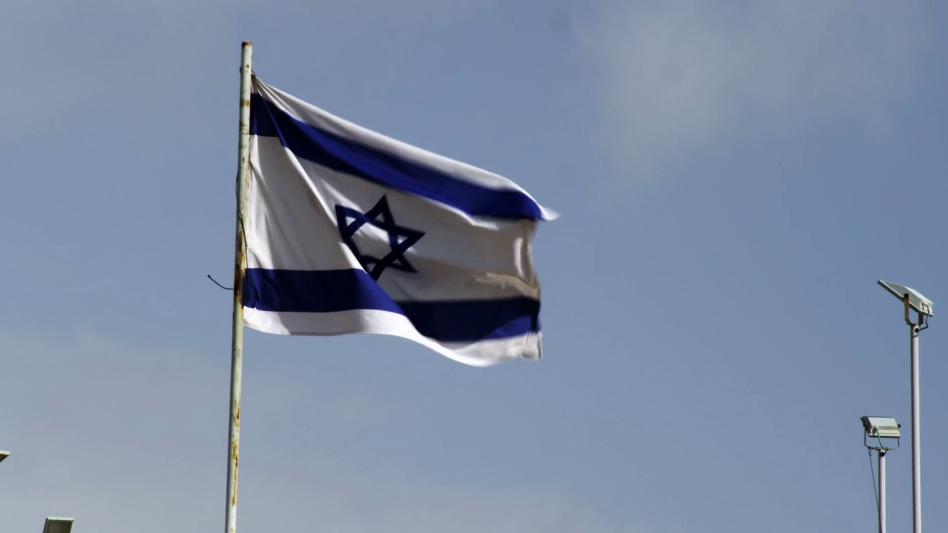 Israeli Flag Blowing In Wind Stock Footage SBV-300076457 - Storyblocks