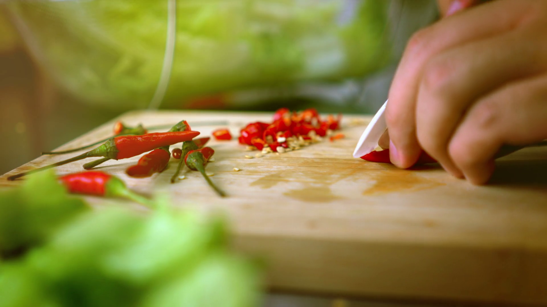 Man Cutting Chili on Cutting Board with Ceramic White Knife - Color ...