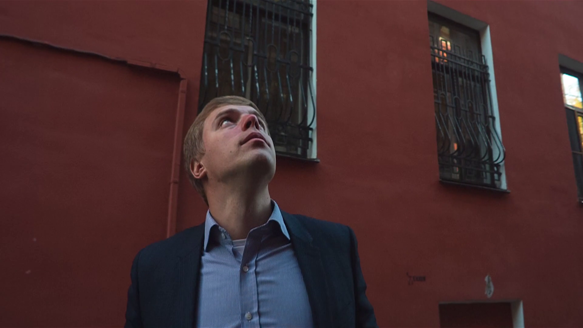 Man Looking Up Between Houses Stock Footage SBV-306246289 - Storyblocks