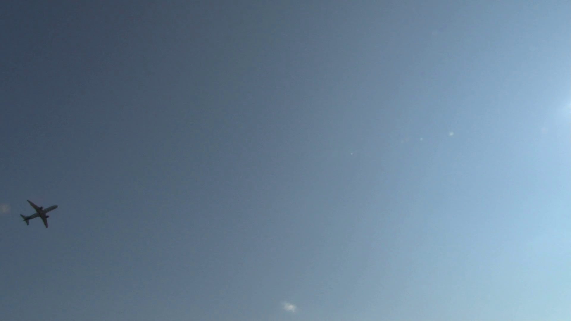 Plane Flying Across Sun Stock Footage SBV-300017345 - Storyblocks