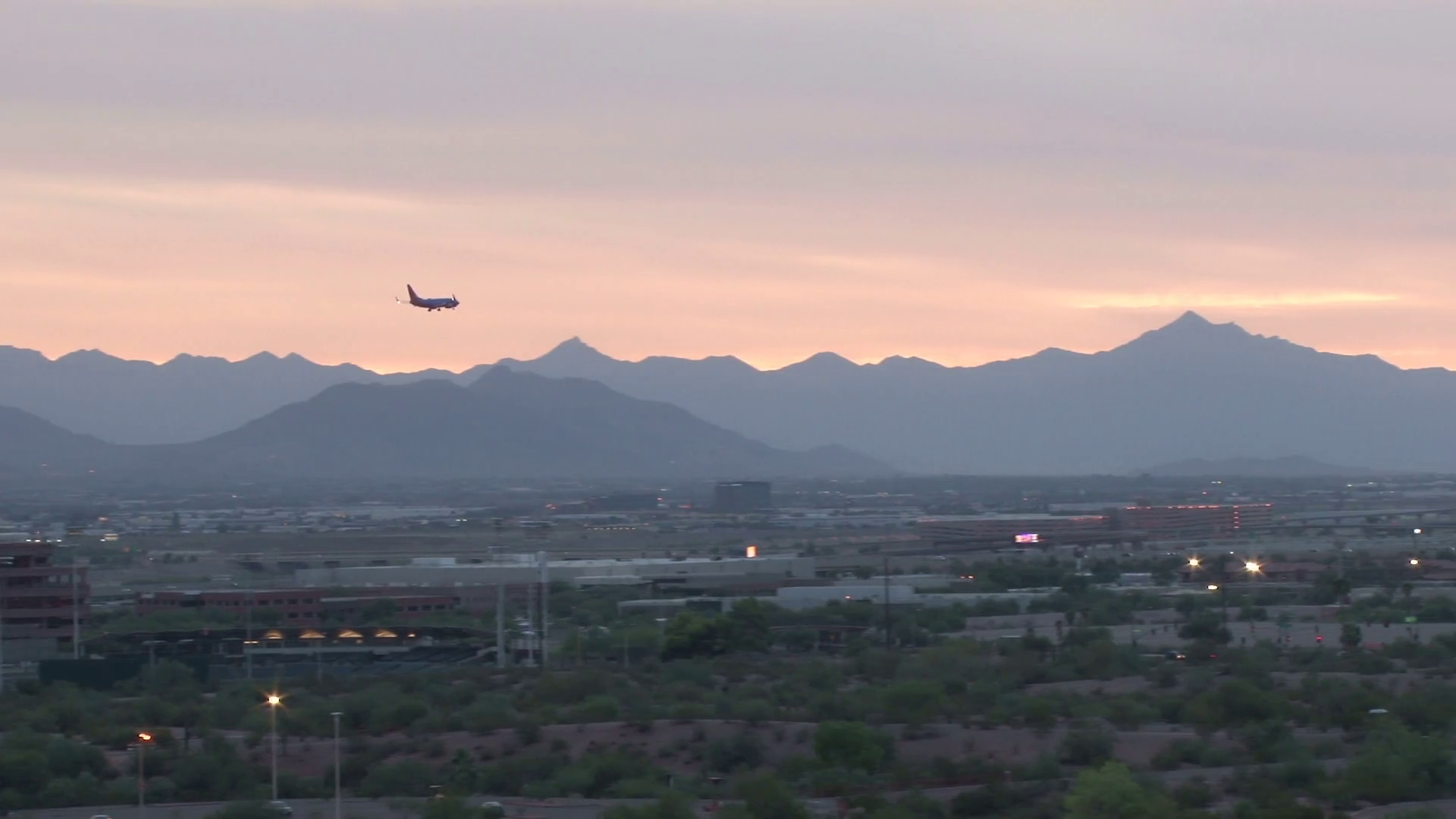 Plane Flying Over Phoenix Arizona Stock Footage SBV-300129631 - Storyblocks
