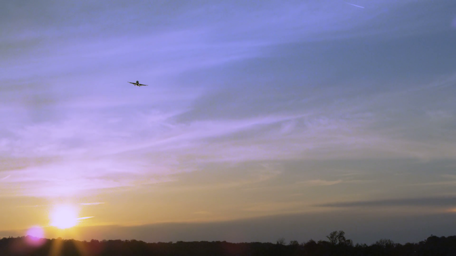 Plane Soaring Over Sunset Sky Stock Video Footage 00:21 SBV-300164987 ...