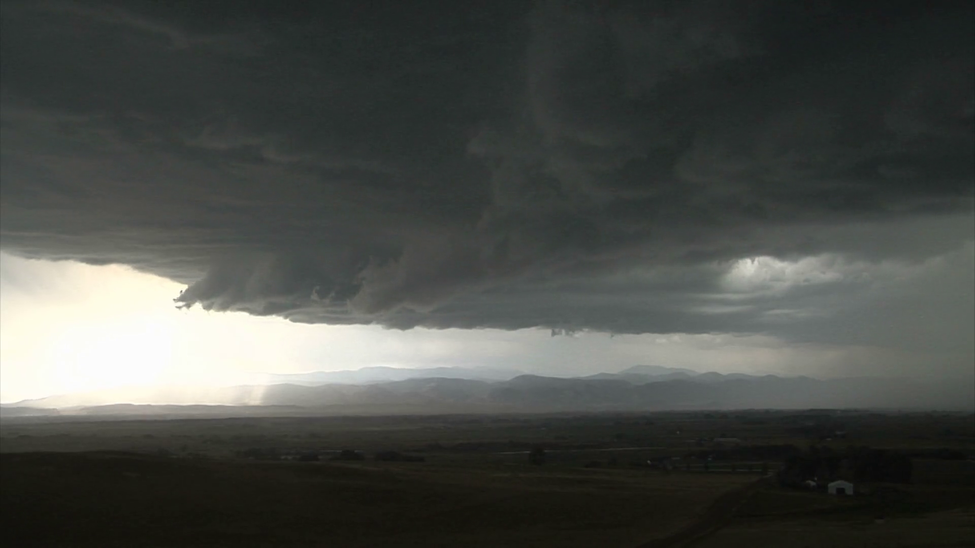 Rain Clouds Moving In Over Landscape Stock Footage SBV-300105729 ...