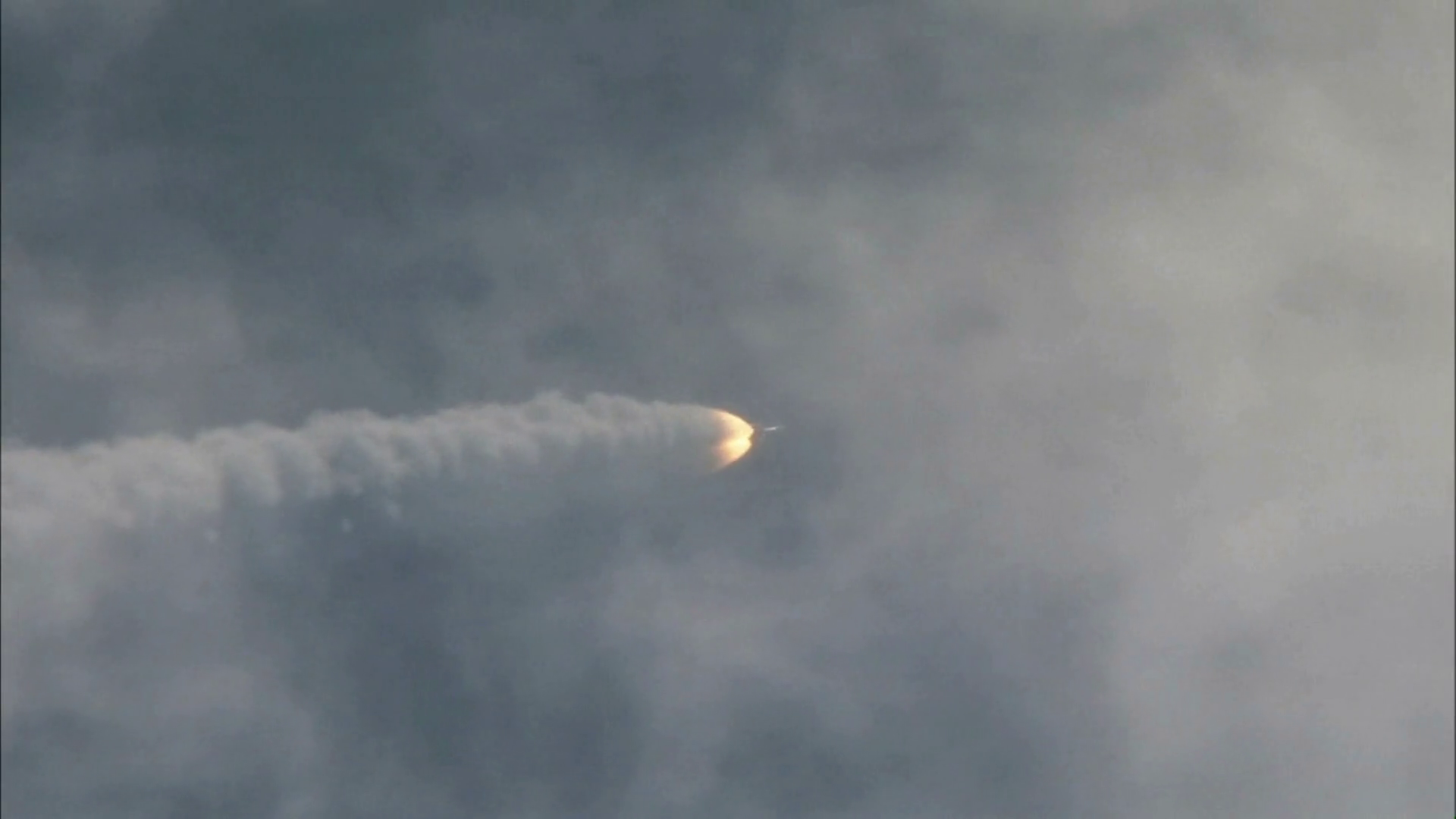 Rocket Disappearing Into Clouds Stock Footage SBV-300104761 - Storyblocks