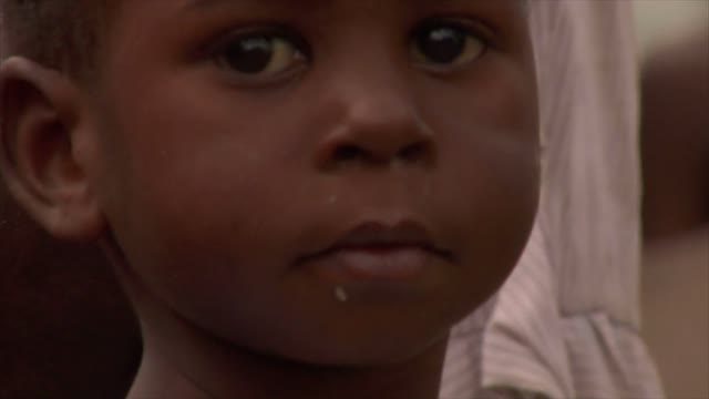 Little Girl Looking Into Camera Stock Footage: Royalty-Free Video Clips ...