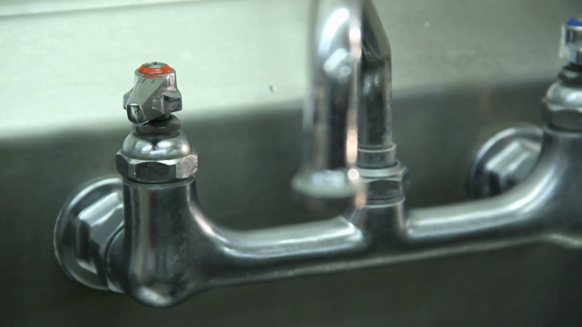 Shot Of Hand Reaching Out To Turn On Hot Water Faucet Stock Video ...