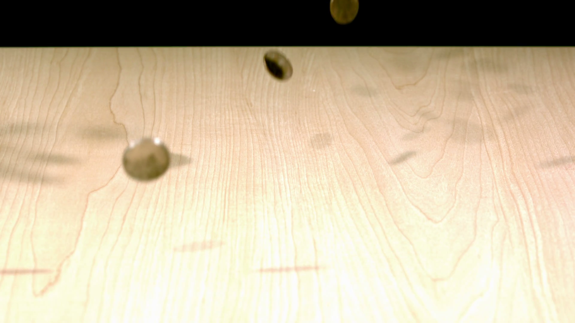 Slow Motion Coins Bouncing On Table 2 Stock Footage SBV-300146323 ...