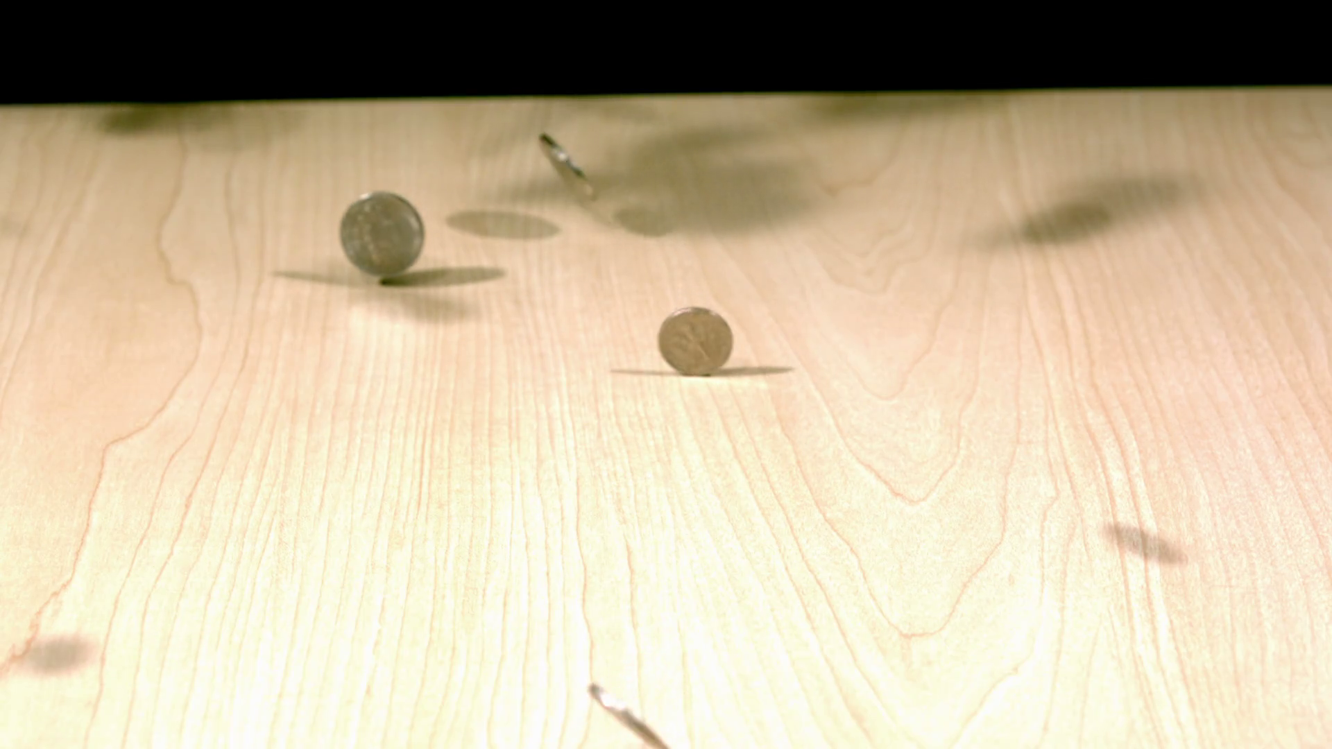 Slow Motion Coins Bouncing Onto Table 1 Stock Footage SBV-300146318 ...