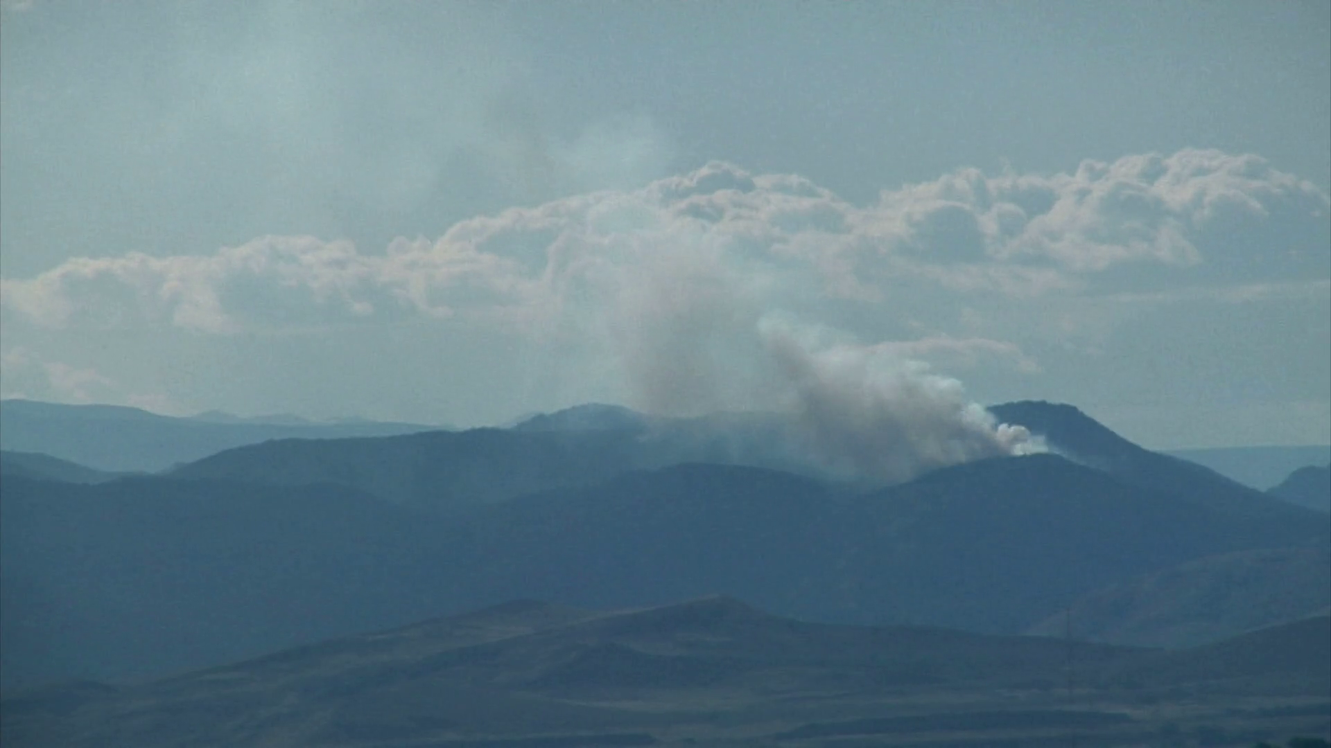 Smoke Coming Off Mountain Top Stock Video Footage 00:20 SBV-300124067 ...