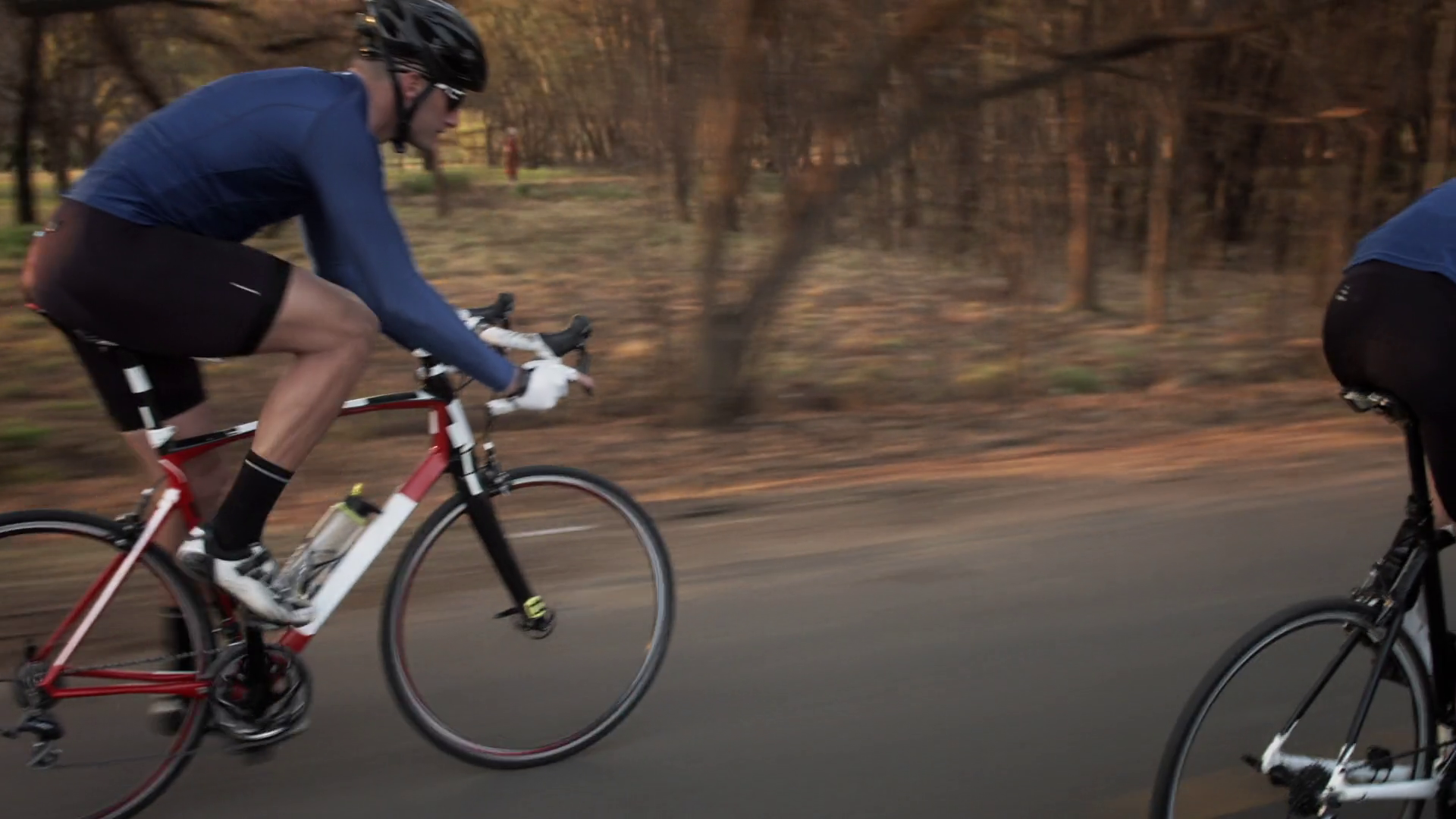 Steadicam Shot Of Two Healthy Men Peddling/ Stock Footage SBV-300610365 ...
