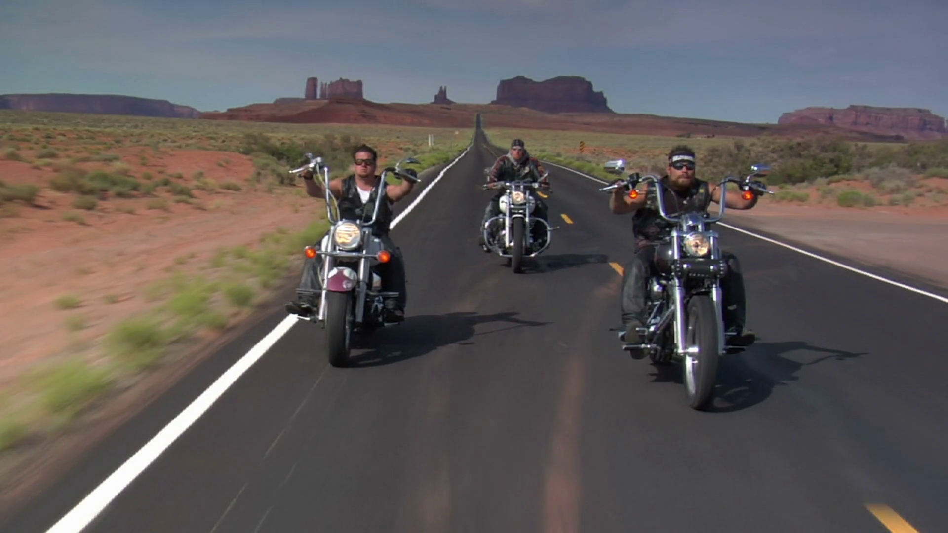 Three Bikers On Redrock Desert Highway Stock Footage SBV-300150085 ...