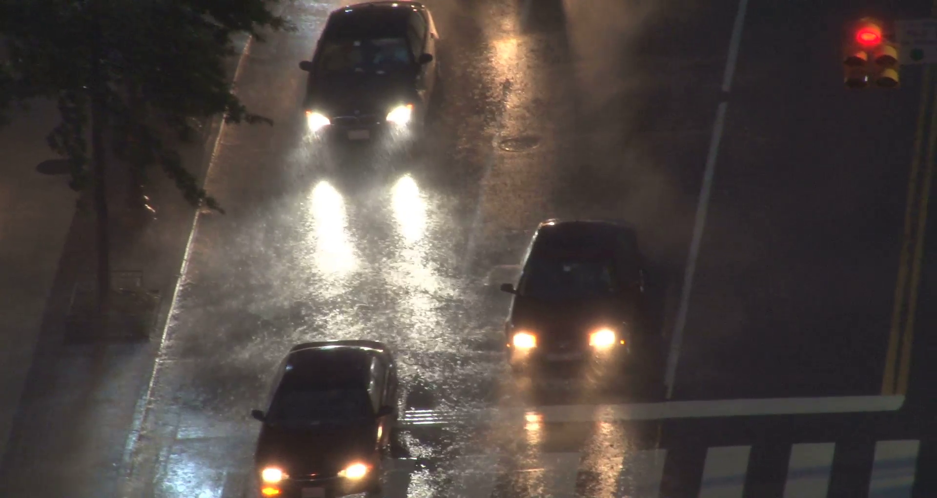 Traffic Fights Through Pounding Rain At Stock Footage SBV-300100607 ...
