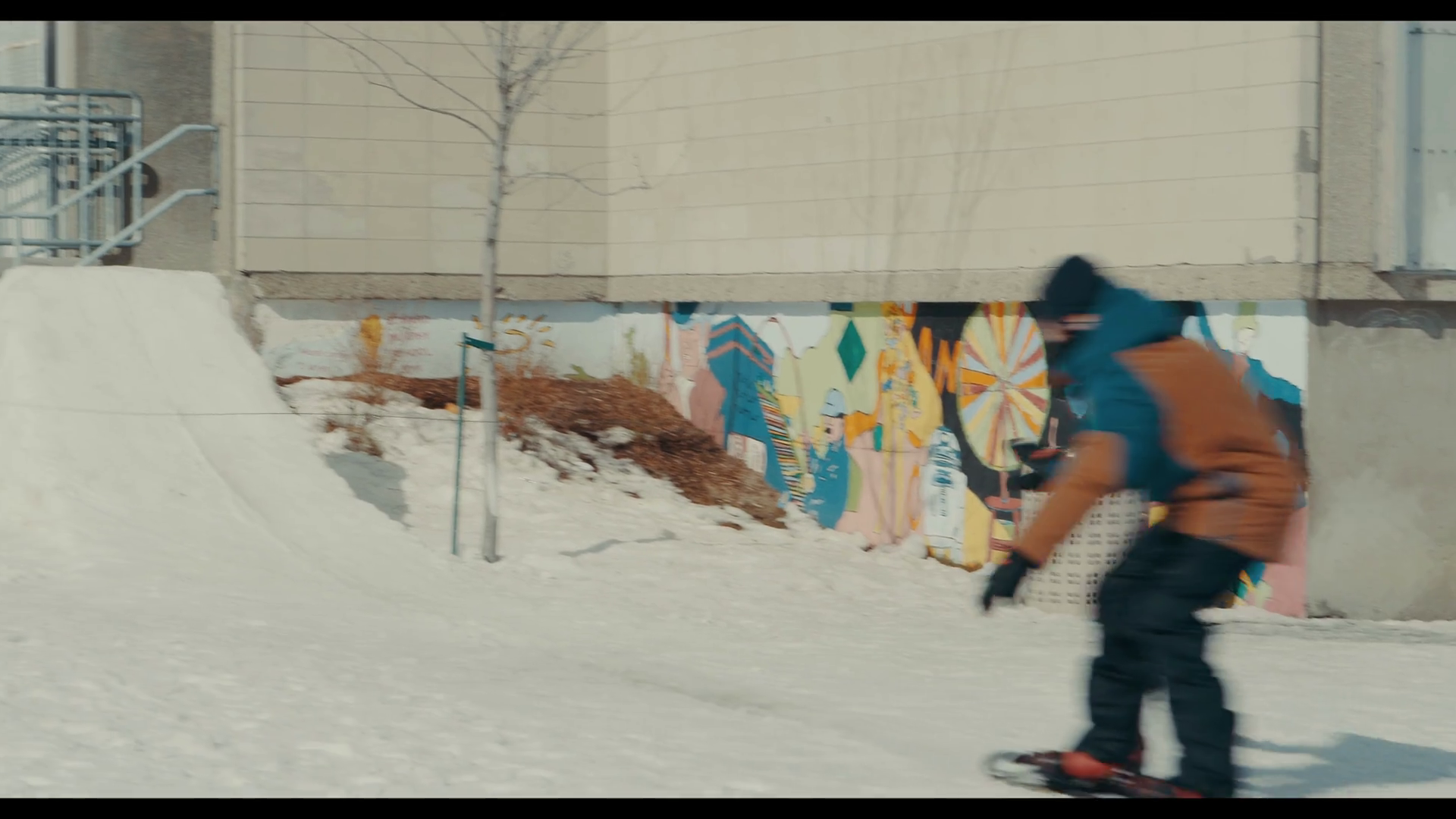4K UHD Shot of Snowboarder Jumping Over Ramp Onto Railing Stock Video ...